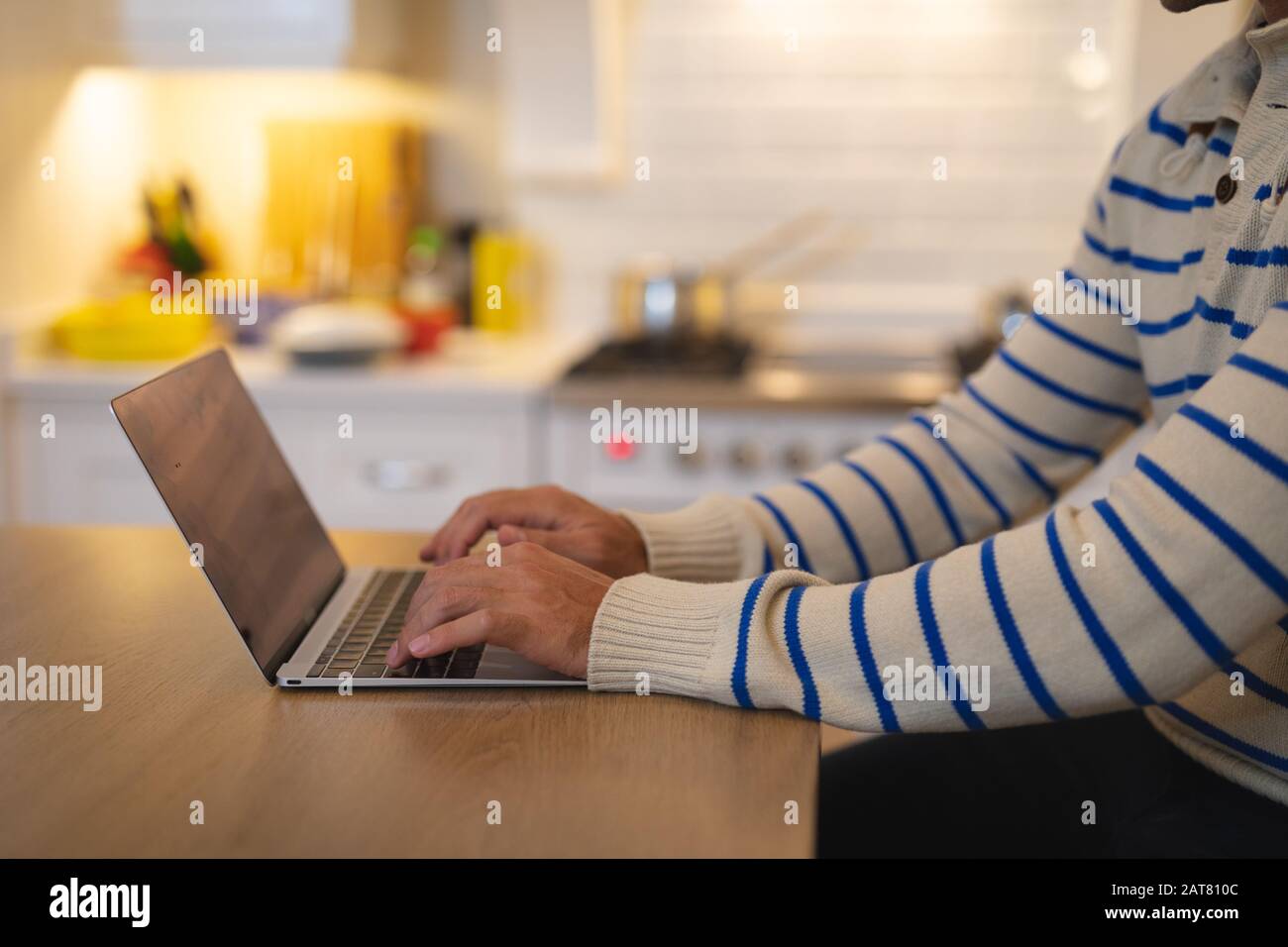 Using computer at home hi-res stock photography and images - Alamy