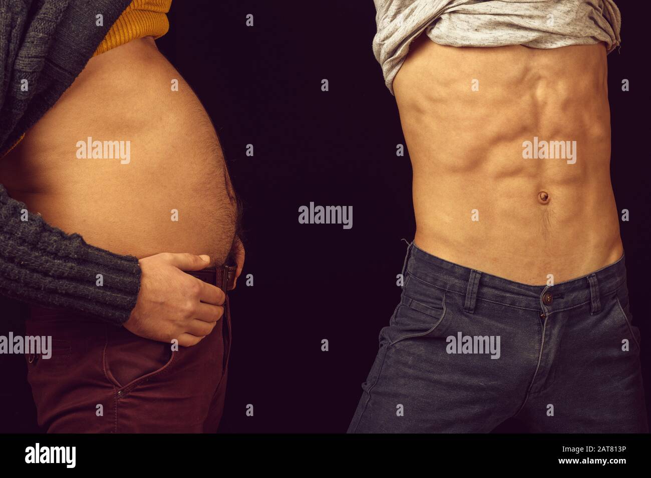 two friends showing paunchy and slim bellies with bare torso and six ...