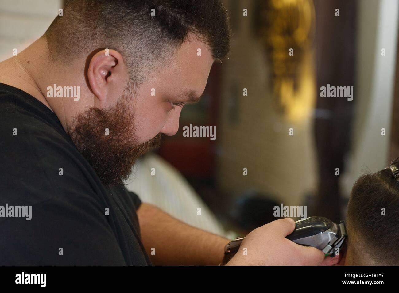 Person using hair clipper hi-res stock photography and images - Alamy