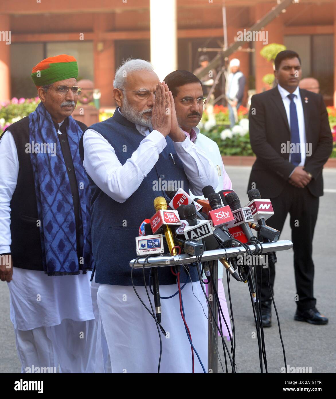 Indian Prime Minister Narendra Modi, hands folded, greets along with ...