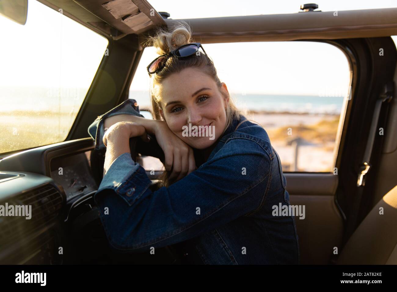 Woman relaxing in a car Stock Photo - Alamy