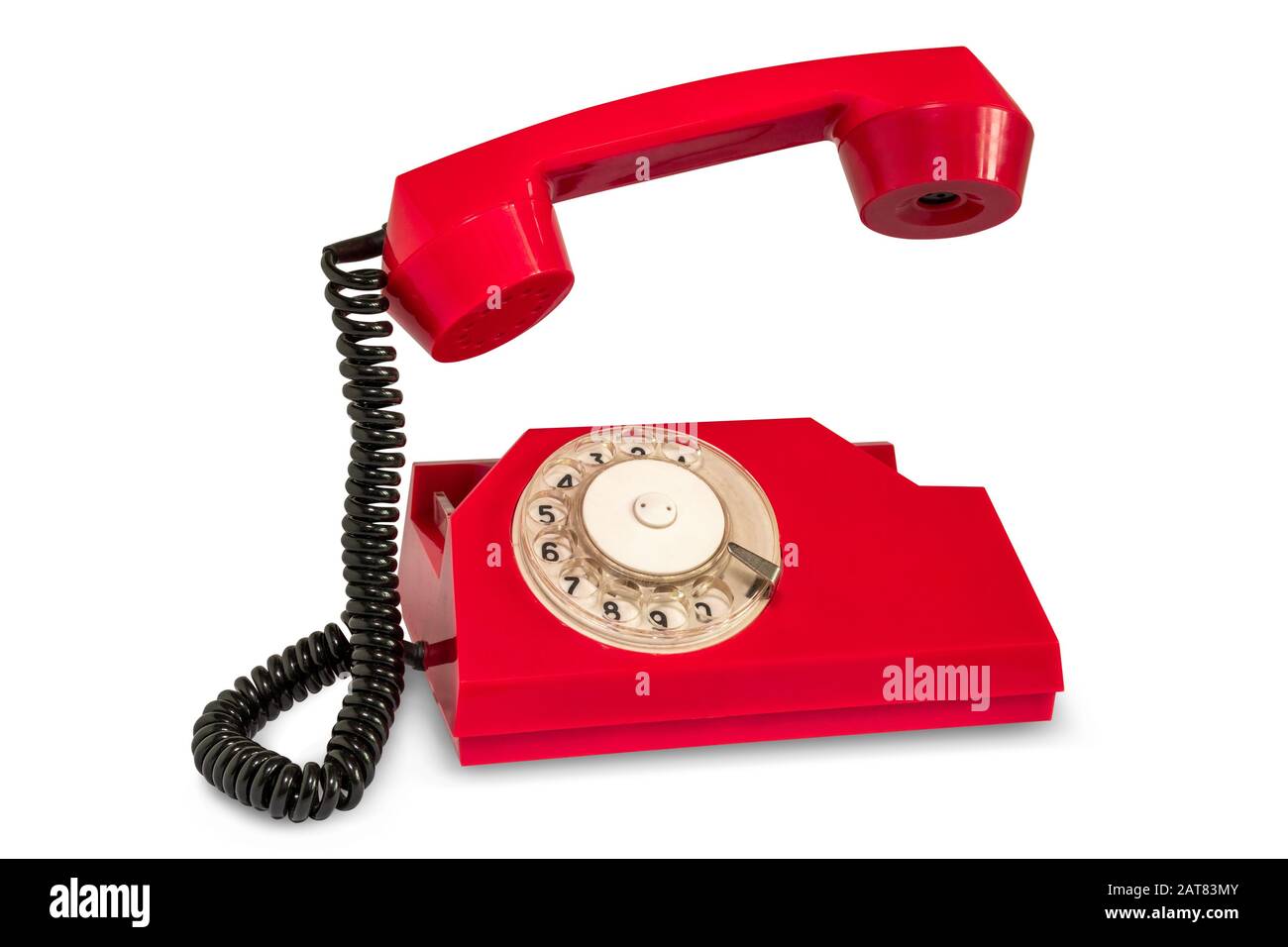 Old rotary phone with the receiver raised in the air. Isolated on white ...