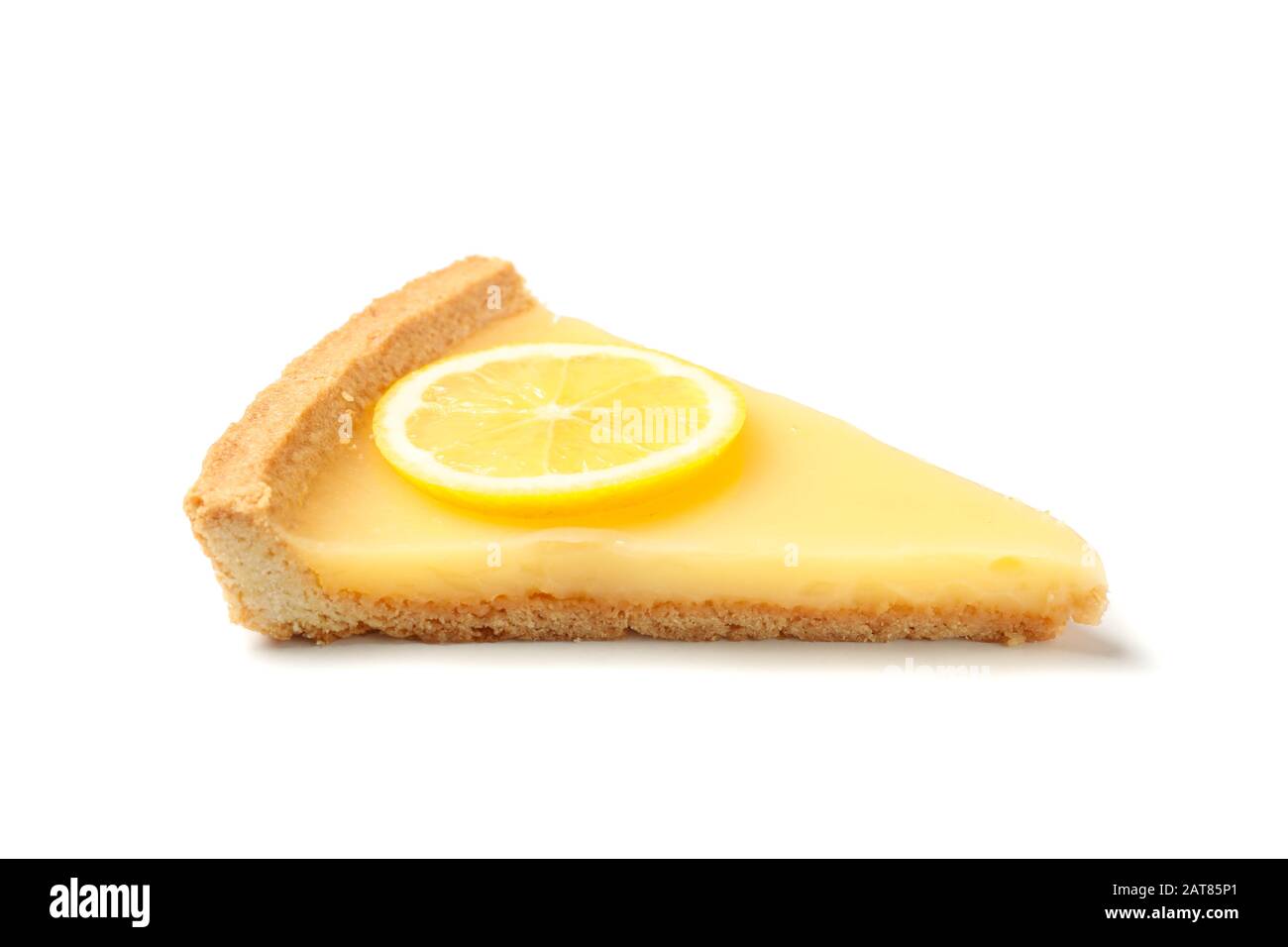 Delicious lemon tart slice isolated on white background Stock Photo - Alamy