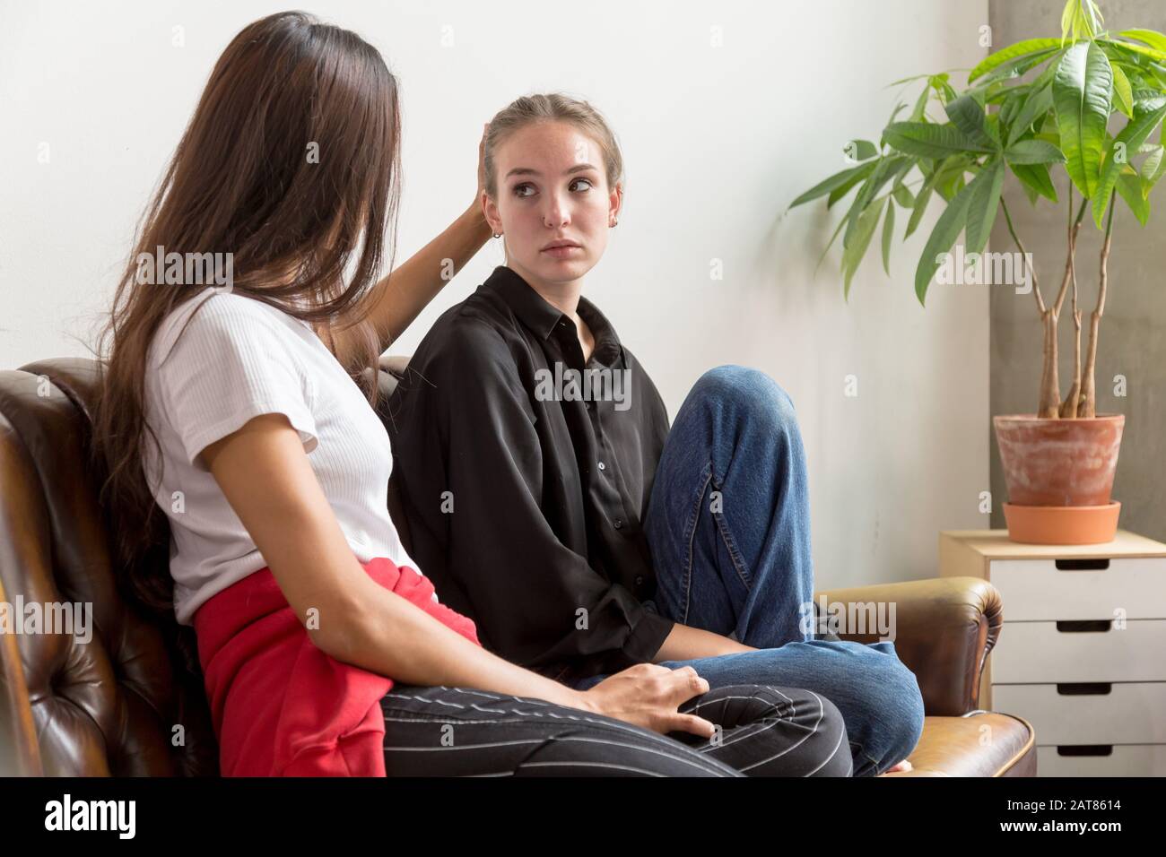 Girlfriend Consoling Female Friend Stock Photo - Alamy