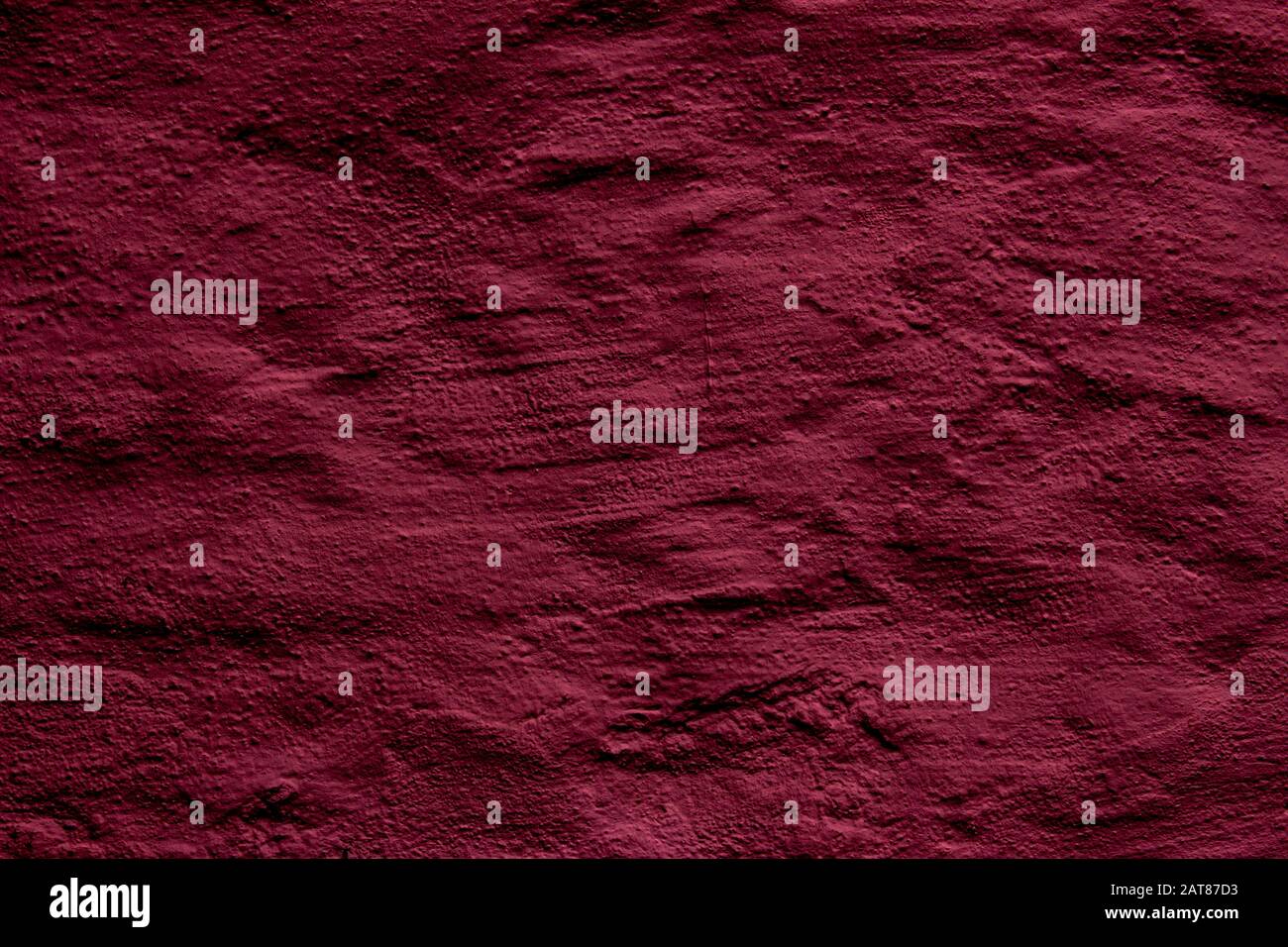 Crimson colored abstract wall background with textures of different ...