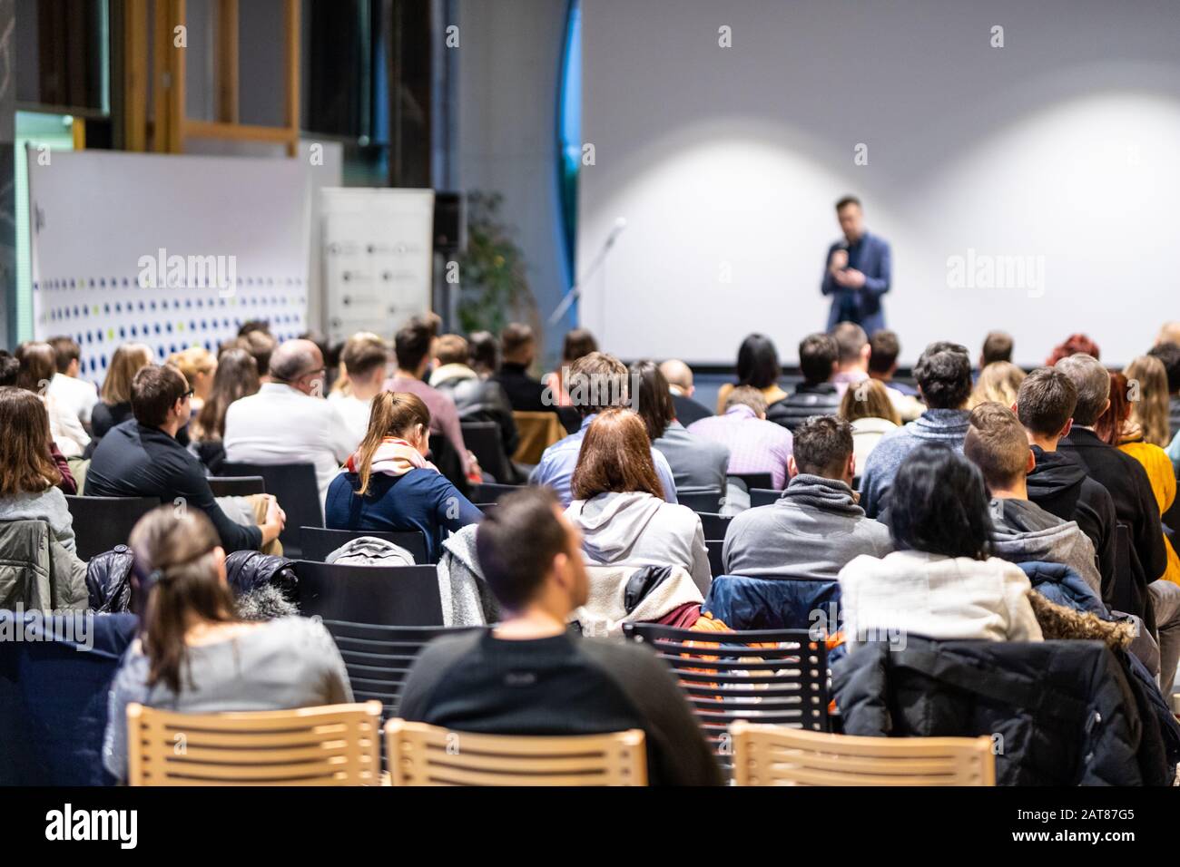 Business speaker giving a talk at business conference event Stock Photo ...