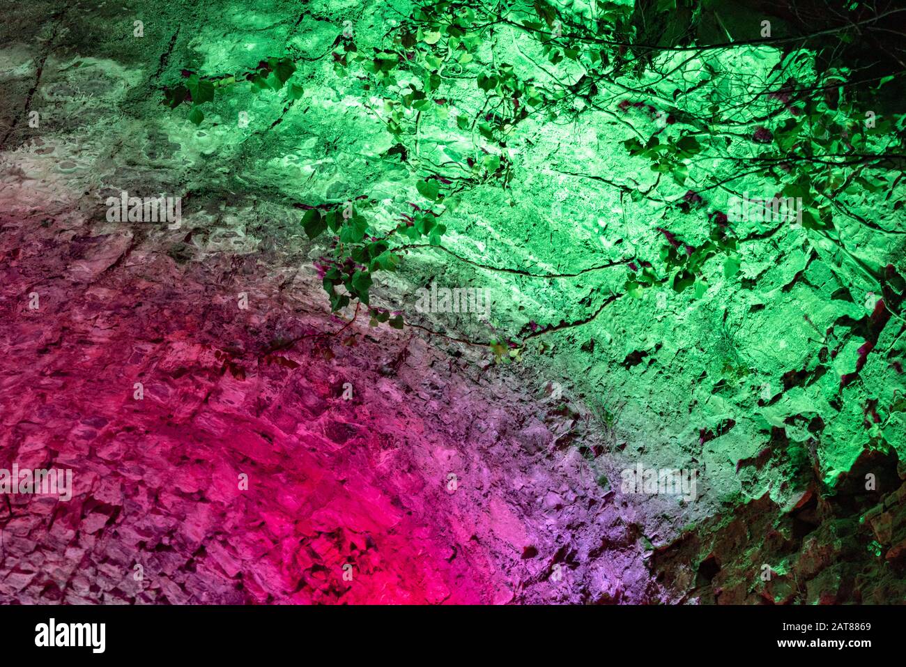 Italian flag's coloured lights on a rock ceiling Stock Photo - Alamy