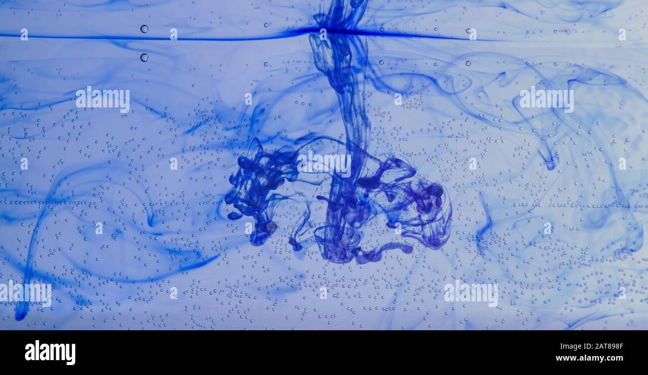 Blue ink poured water hi-res stock photography and images - Alamy
