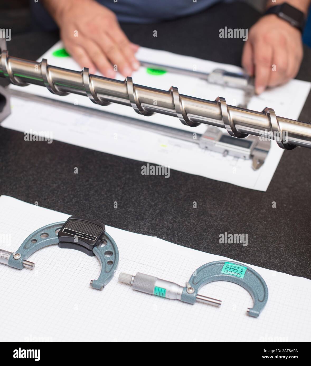 Technician is making a quality control on the product Stock Photo - Alamy