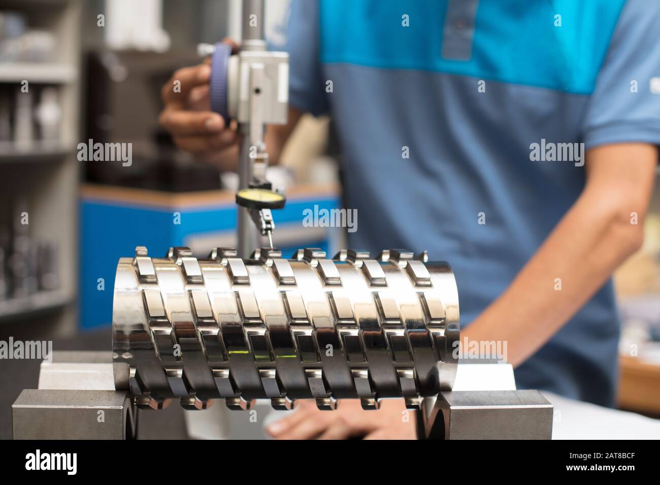 Technician is making a quality control on the product Stock Photo - Alamy