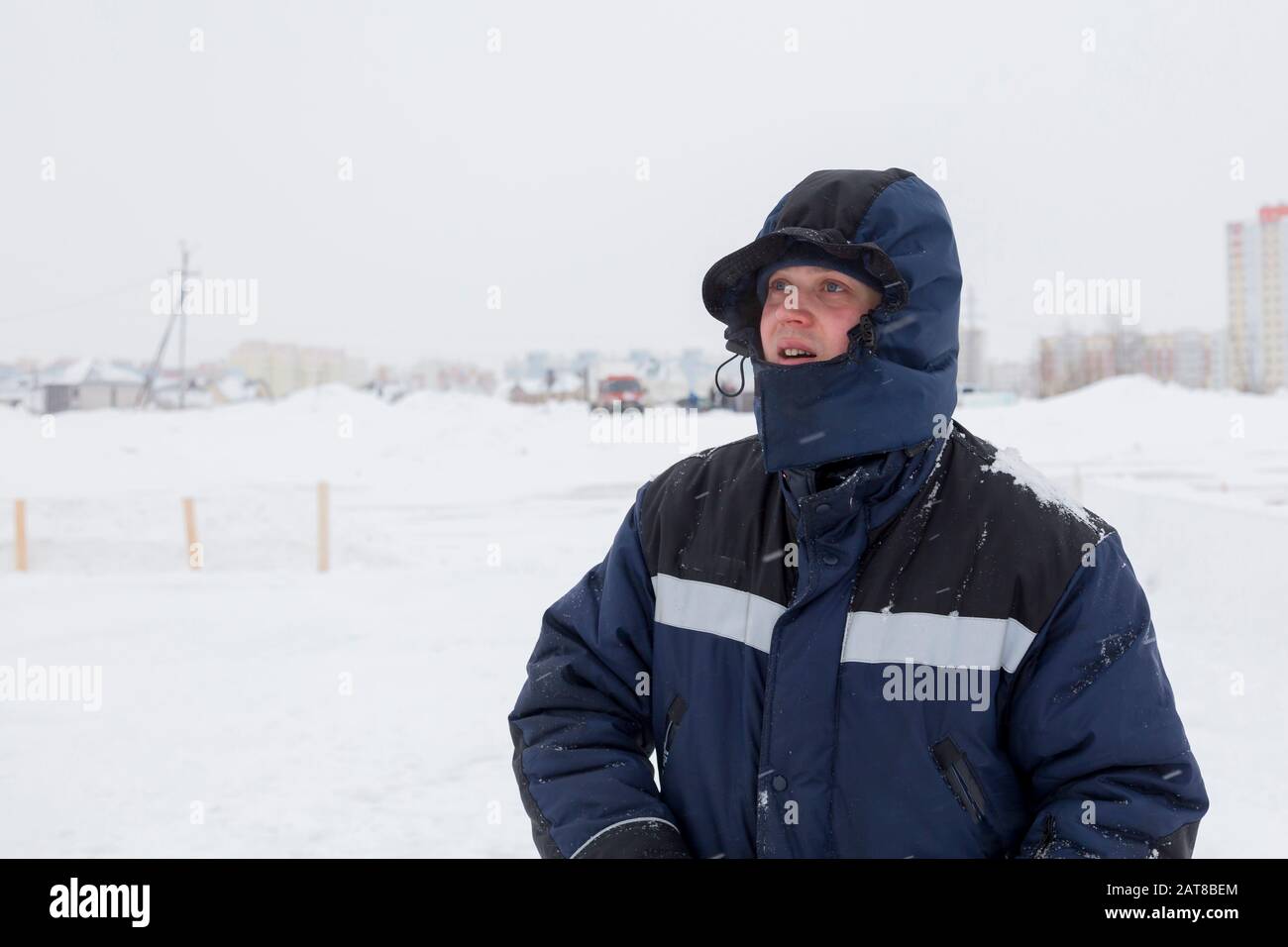 Closeup portrait of a worker on the ice of a frozen river Stock Photo ...