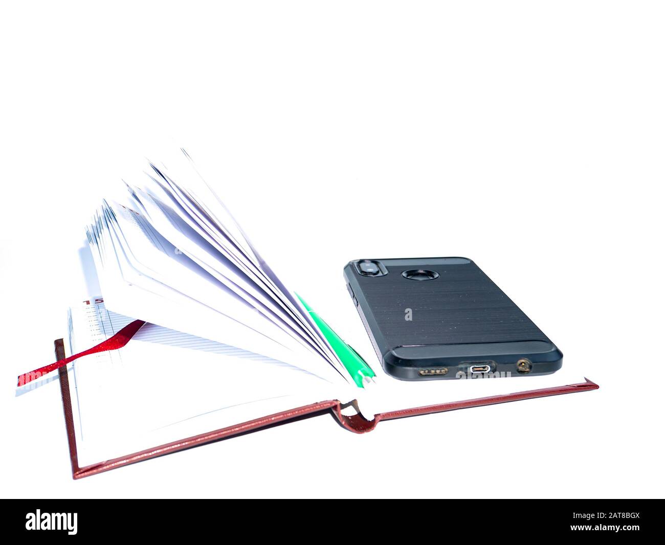 Weekly and mobile phone on a white background. Business. Work. Place ...