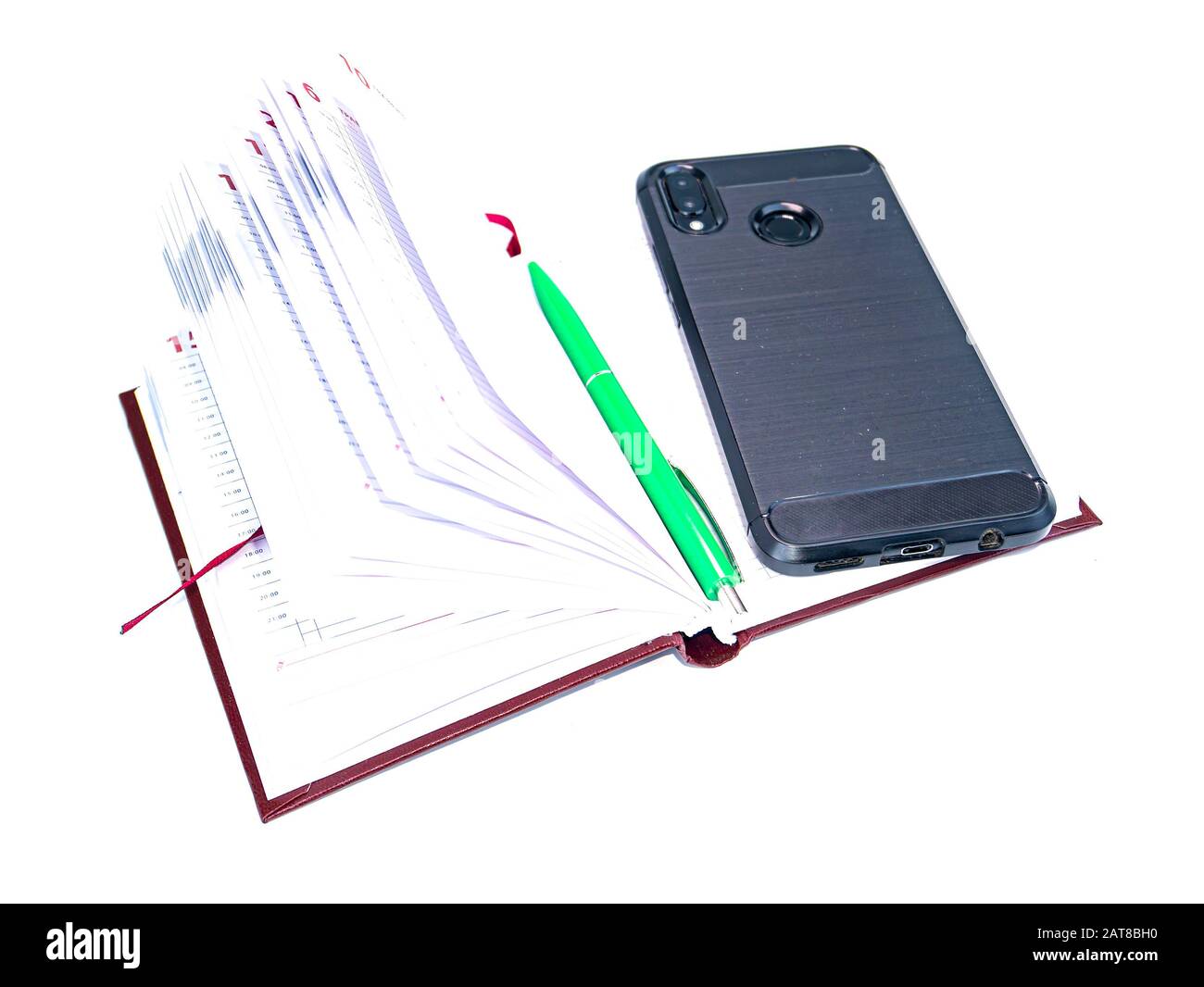 Weekly and mobile phone on a white background. Business. Work. Place ...