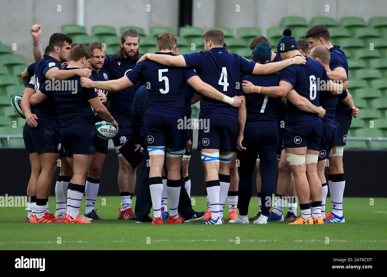 Scotland team huddle during the captain's run at the Aviva Stadium ...
