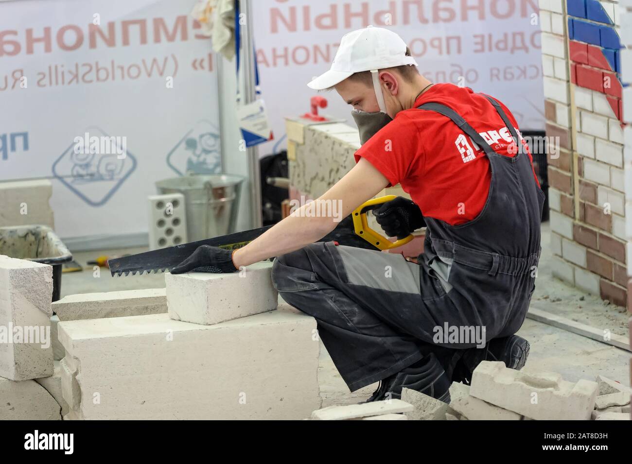 Young bricklayer helmet hi-res stock photography and images - Alamy