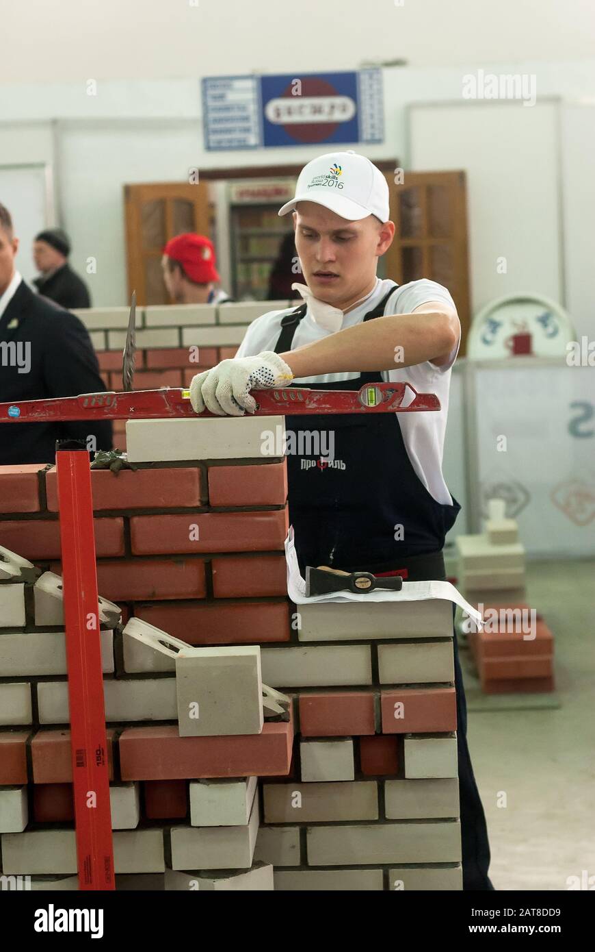 Young bricklayer helmet hi-res stock photography and images - Alamy