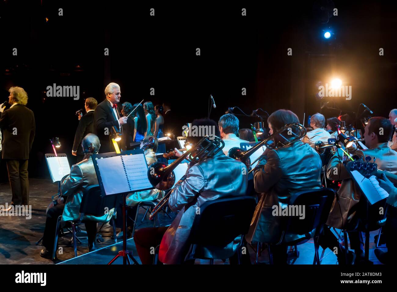 Orchestra with musical instruments and performers during the ...