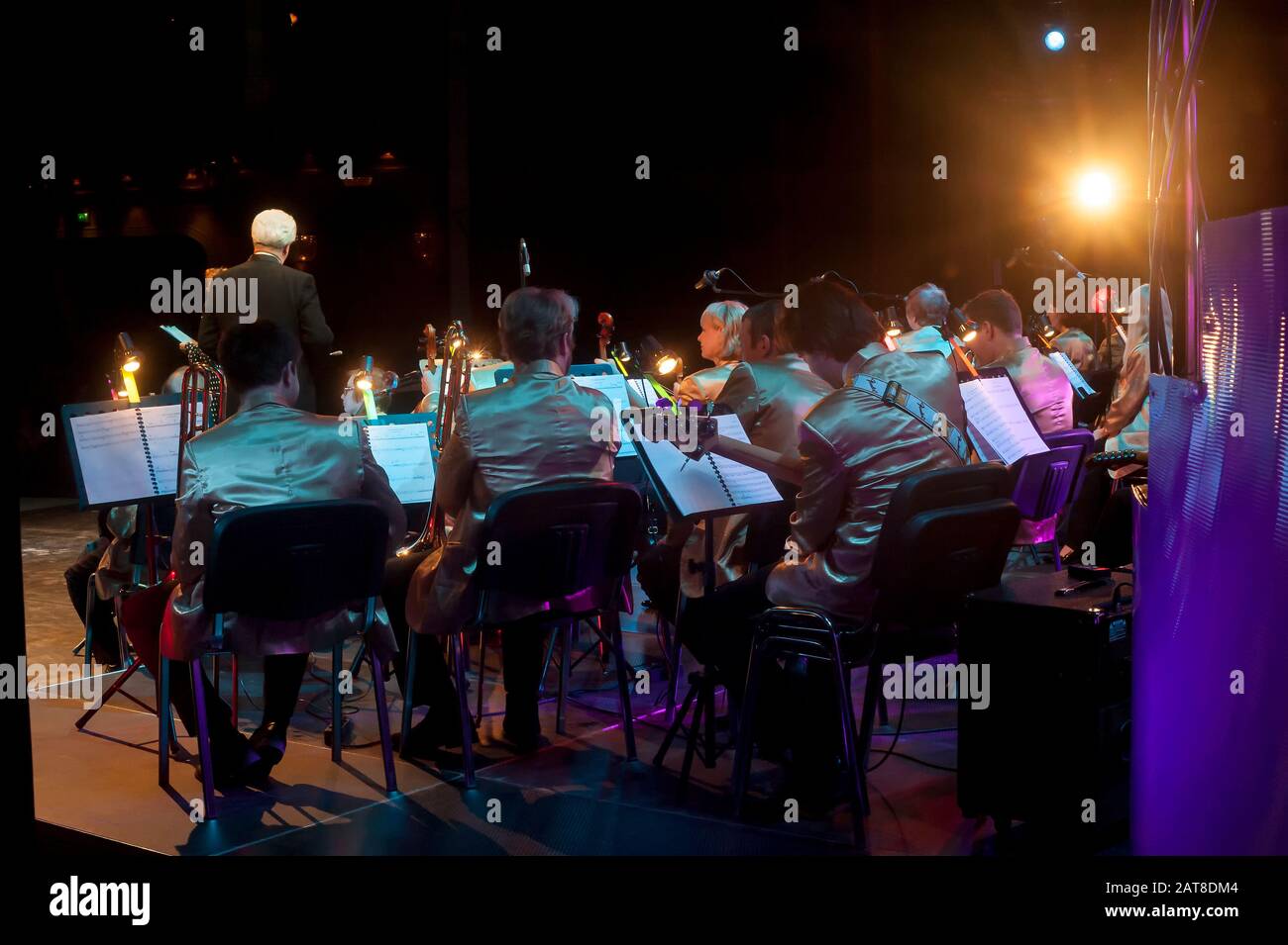 Orchestra with musical instruments and performers during the ...