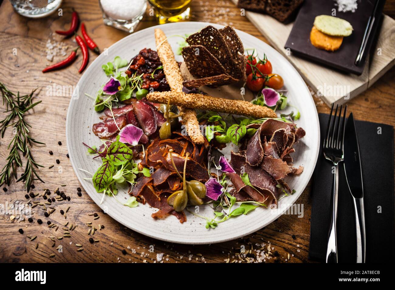 Meat platter for two served on a plate in restaurant Stock Photo - Alamy