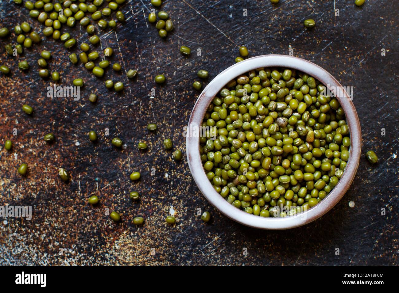 Dried mung beans in a bowl on a dark background top view Stock Photo ...