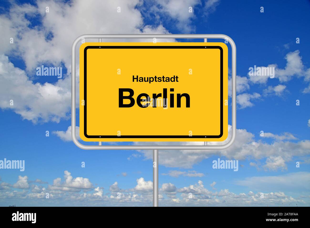 city sign Hauptstadt Berlin, capital Berlin against blue cloudy sky ...
