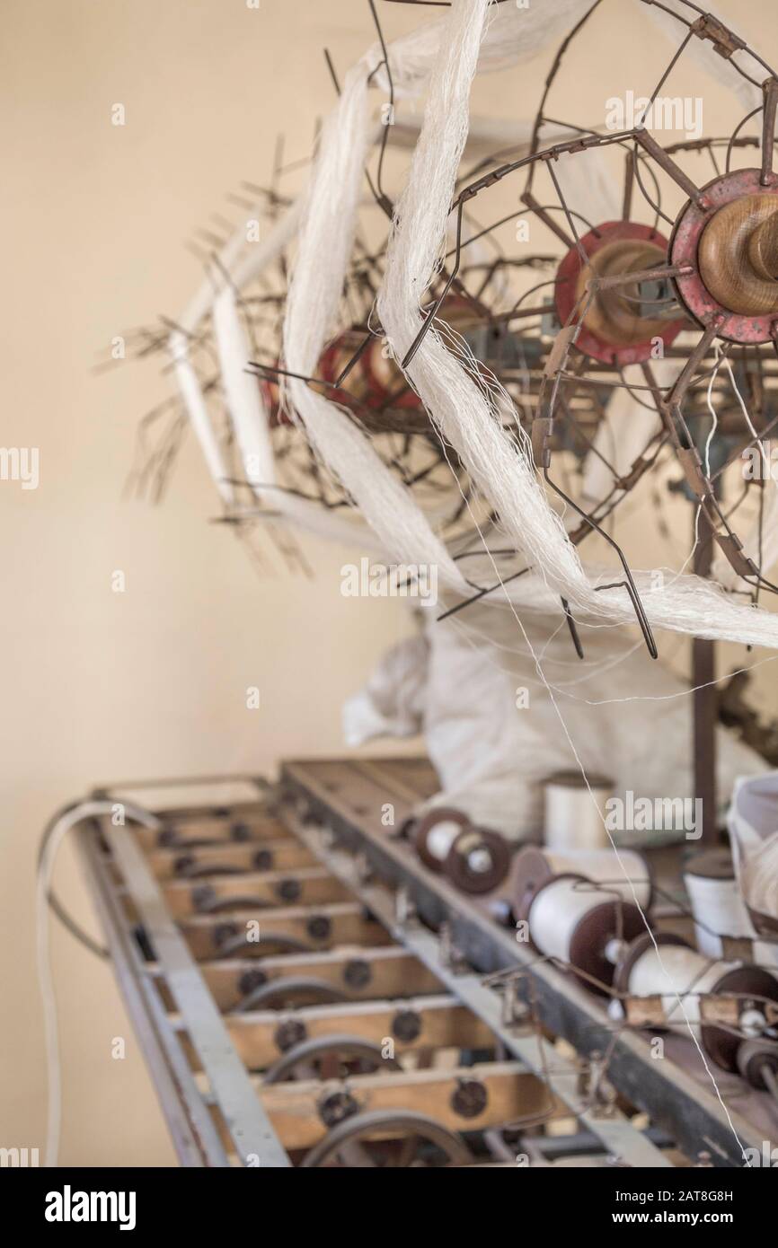 Old machine spinning silk at hi-res stock photography and images - Alamy