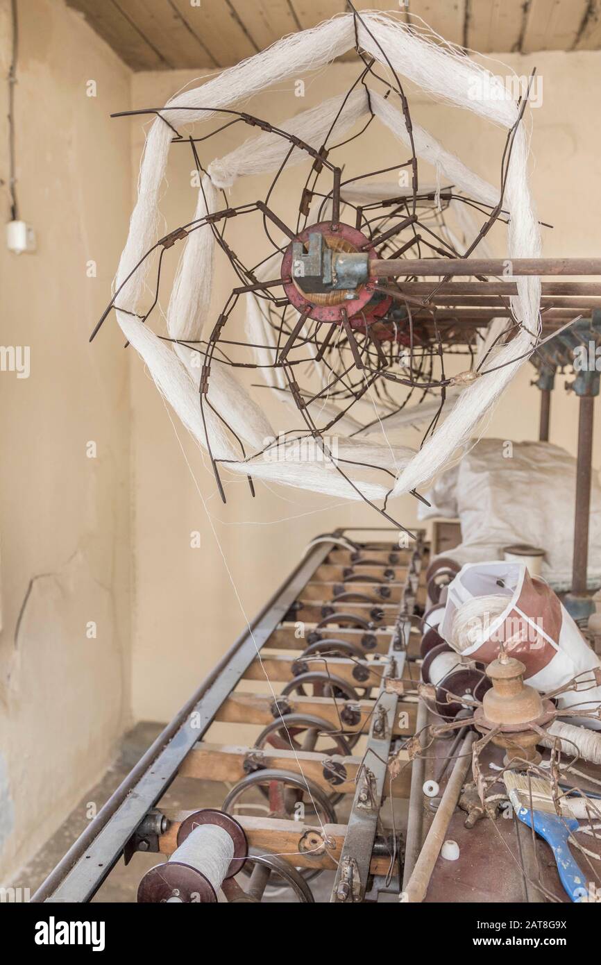 a manual machine to produce silk fiber from silkworm Stock Photo - Alamy