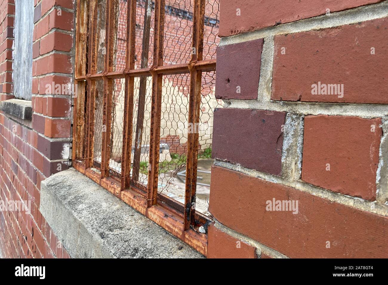 Brick through window broken hi-res stock photography and images - Alamy