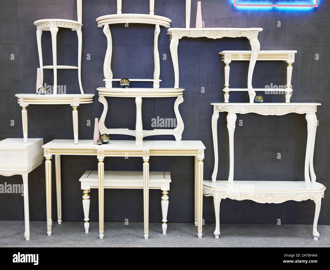 Installation of vintage tables furniture Stock Photo - Alamy
