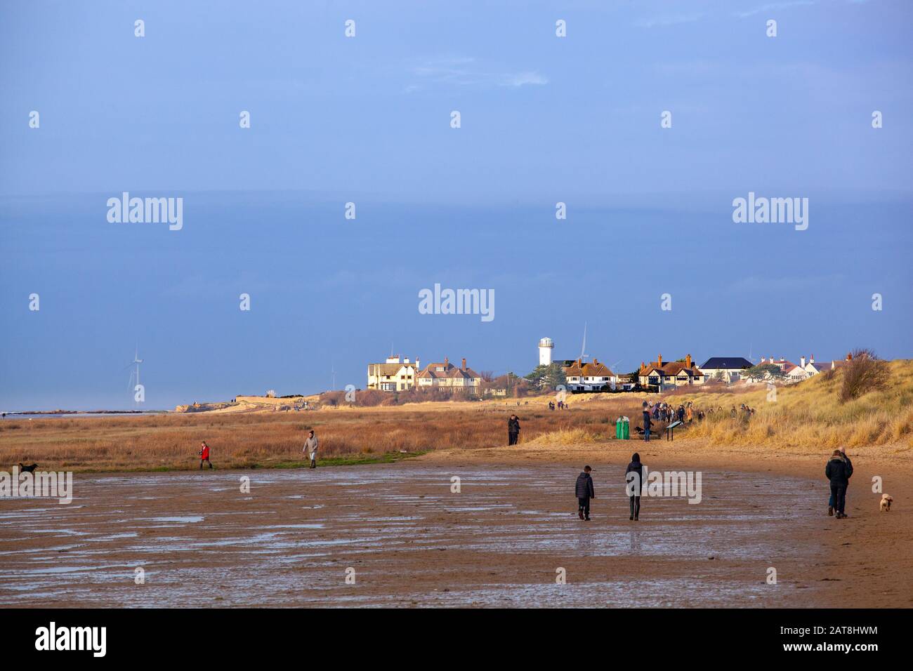 People walking along the coastal path along the river Dee through the ...