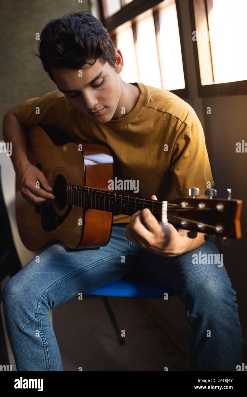 Teenage musician rehearsing hi-res stock photography and images - Alamy
