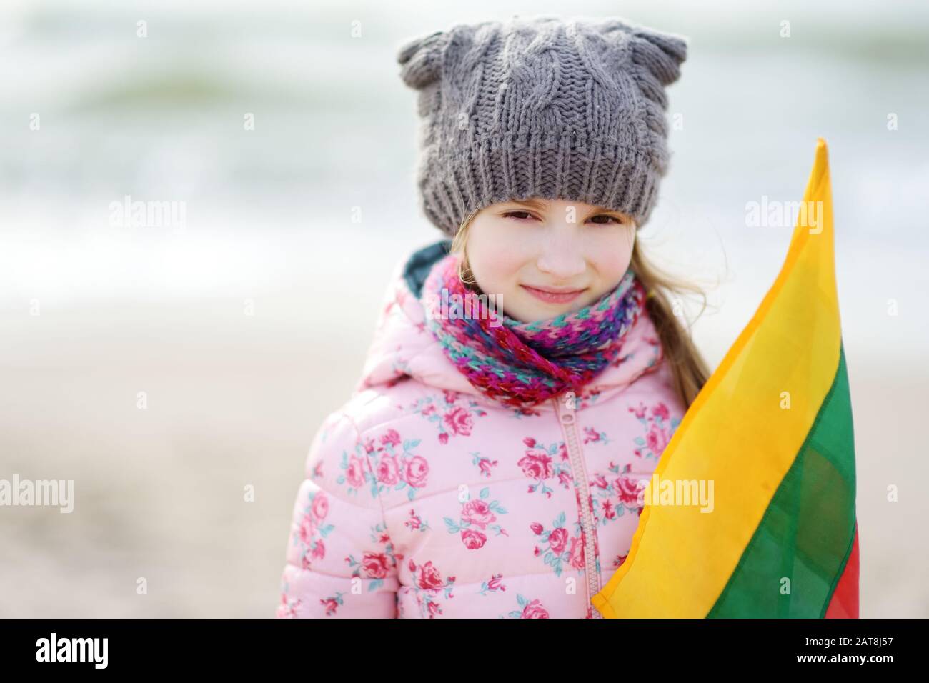 Cute little girl celebrating Lithuanian Independence Day holding ...