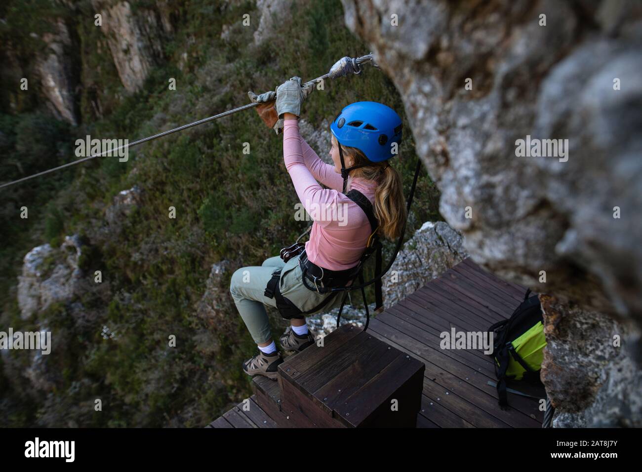 Caucasian woman doing zip line Stock Photo - Alamy
