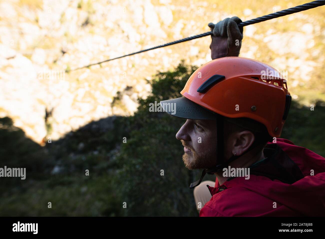Shot man on zipline hi-res stock photography and images - Alamy