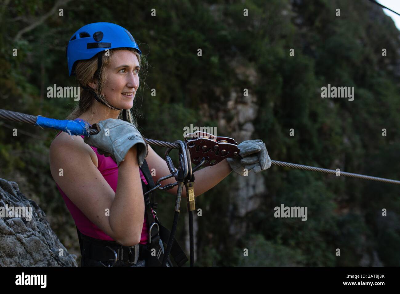 Caucasian woman ready to zip line Stock Photo - Alamy