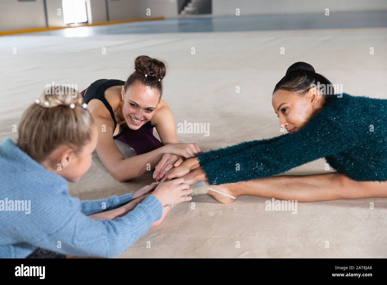 Gymnasts doing the splits Stock Photo - Alamy