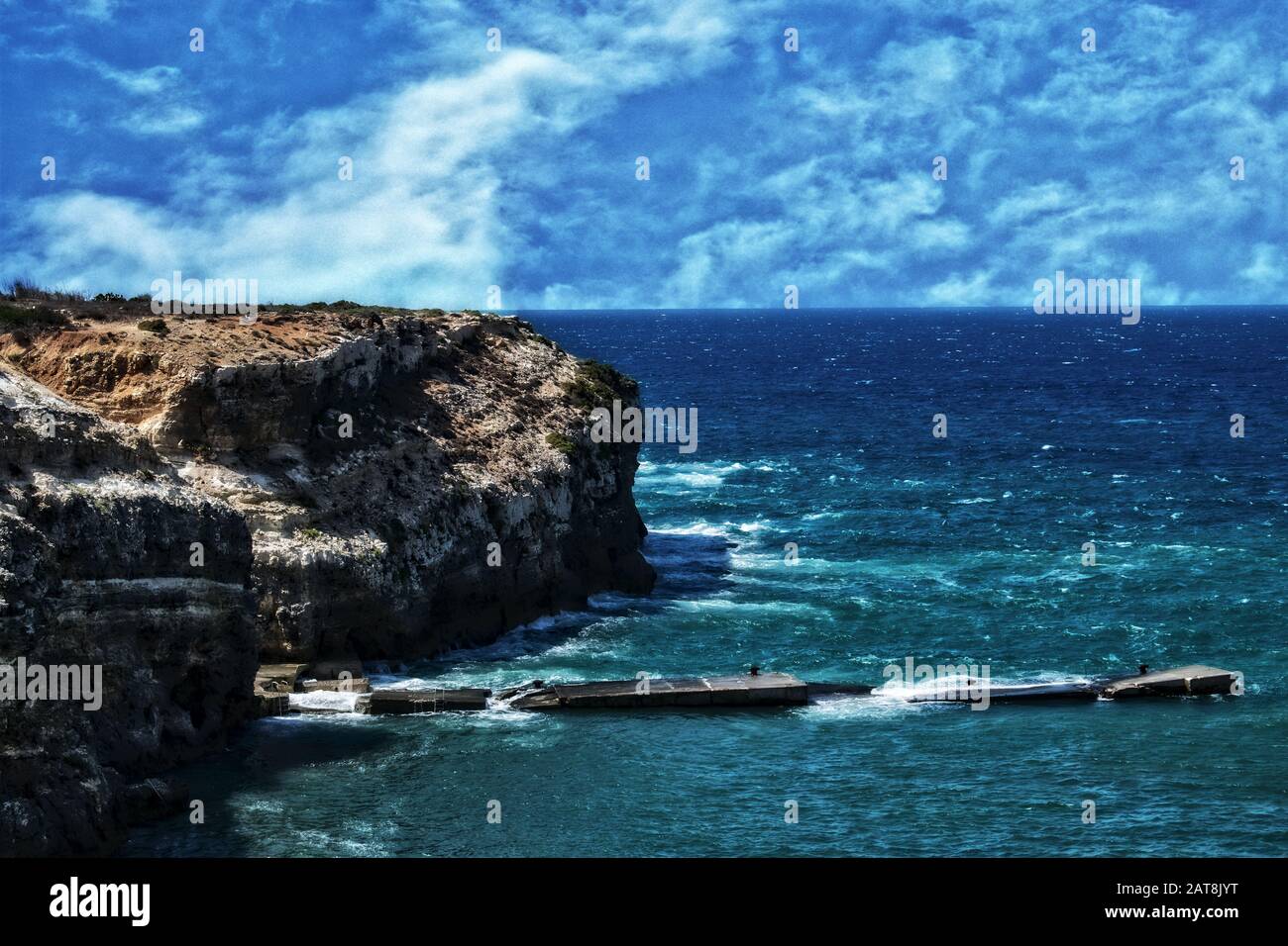 Rough Sea hitting Rocks Stock Photo - Alamy