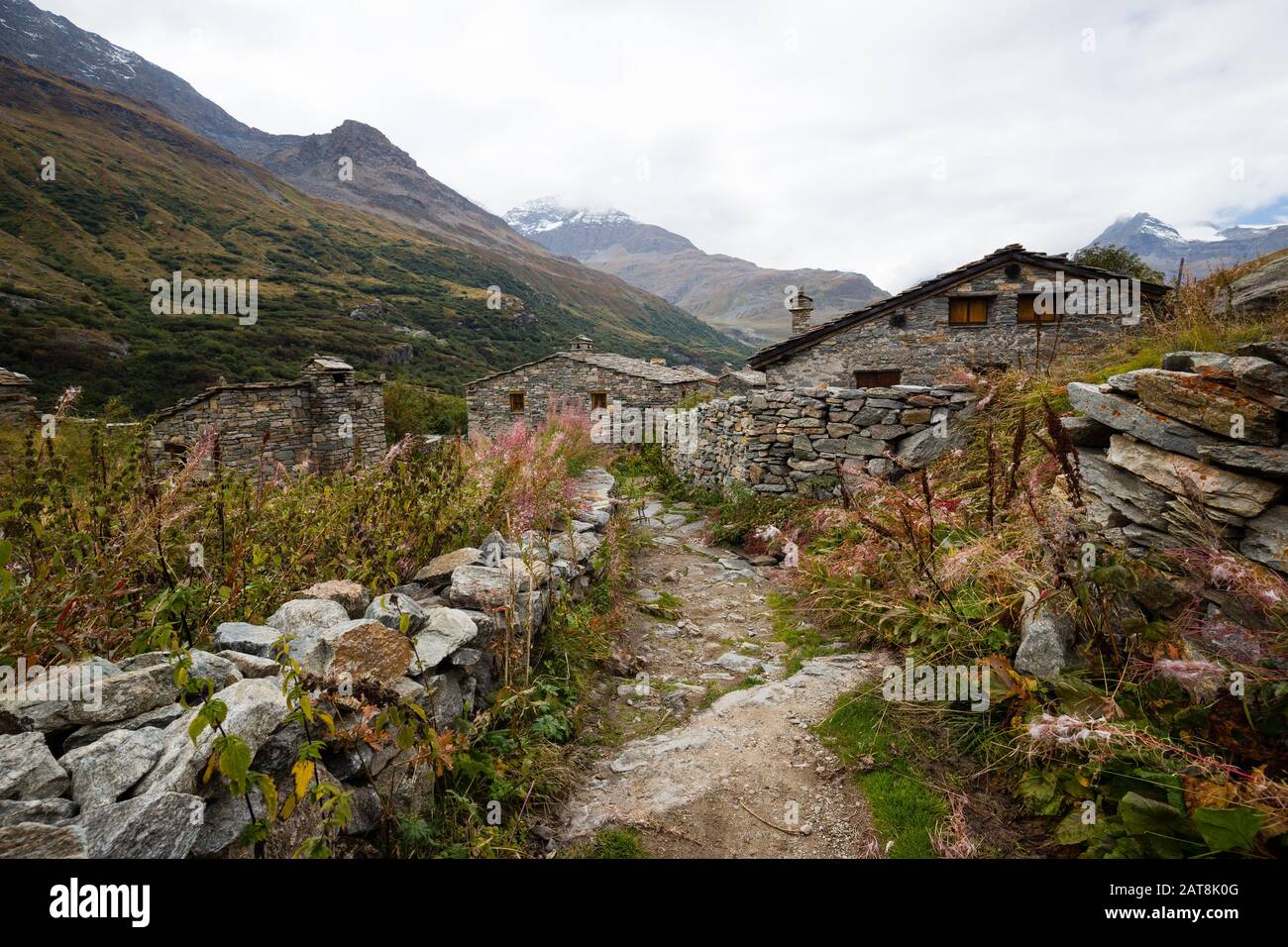 Old houses in the Alps mountains. Stone walls, nobody Stock Photo - Alamy