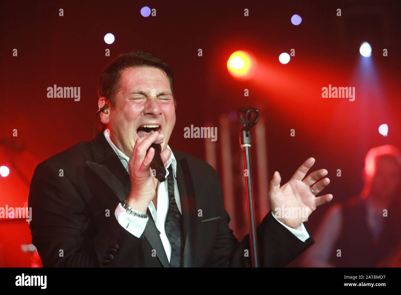 Singer Tony Hadley sings onstage during a charity performance at the ...