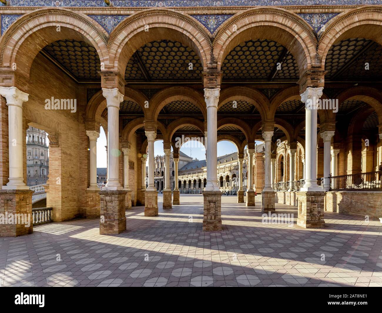 Beautiful arcades on the central square of Seville Plaza de Espana ...