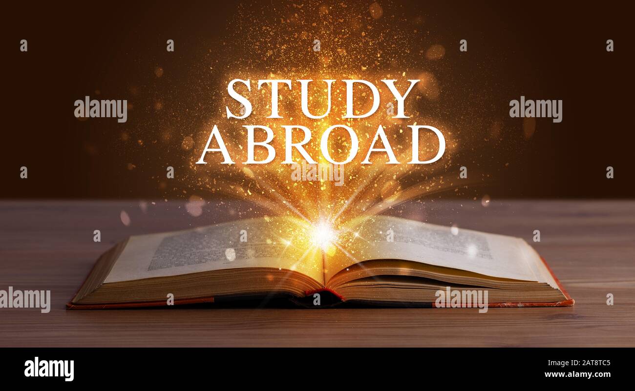 STUDY ABROAD inscription coming out from an open book, educational ...