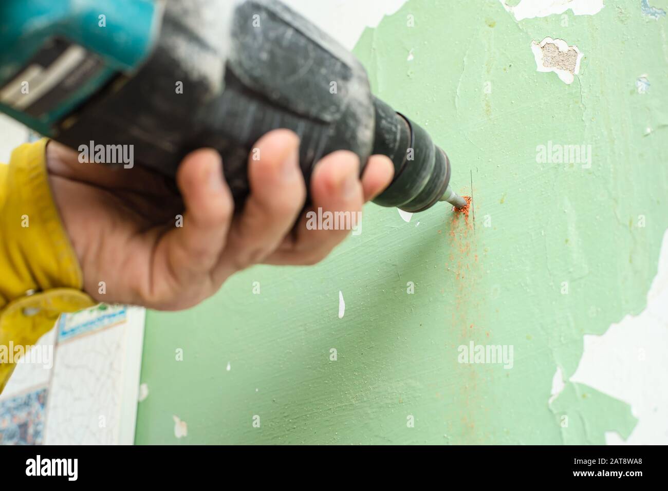 Man Using Hole In Wall High Resolution Stock Photography and Images - Alamy