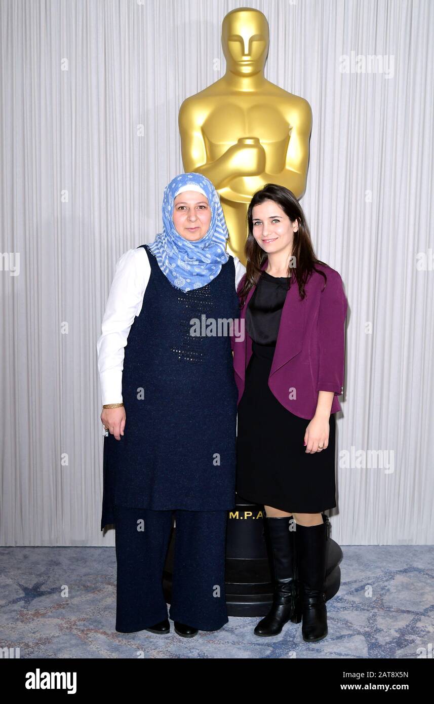Waad al-Kateab (right) and guest attending the Academy Award Nominees ...