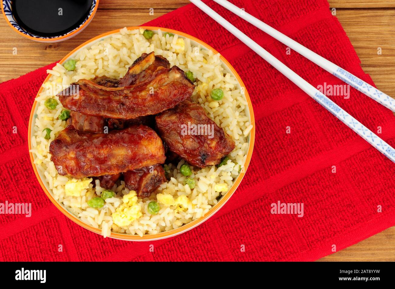 Chinese style mini pork ribs with egg fried rice Stock Photo - Alamy