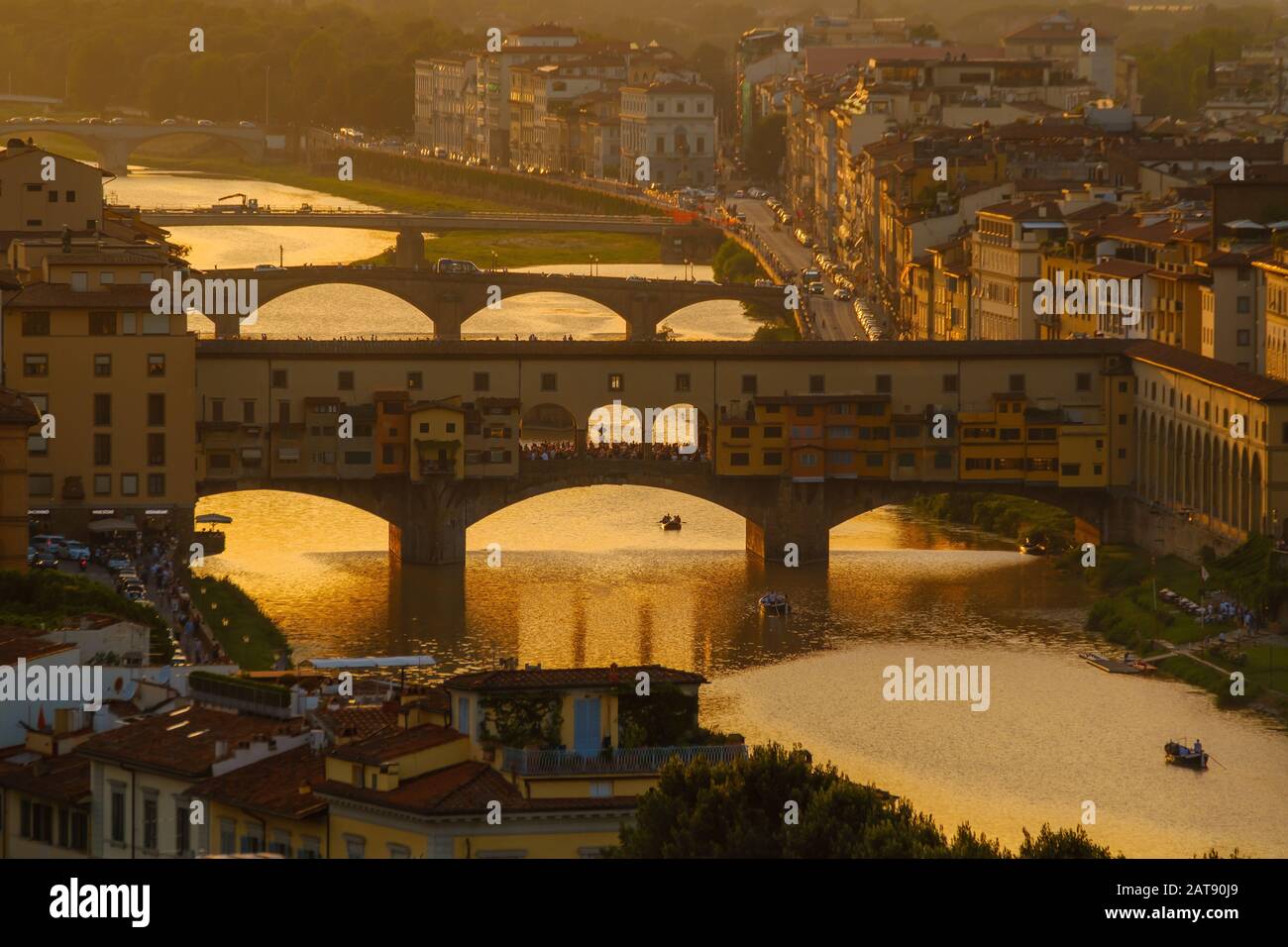 Old bridge over river during sunset Stock Photo - Alamy
