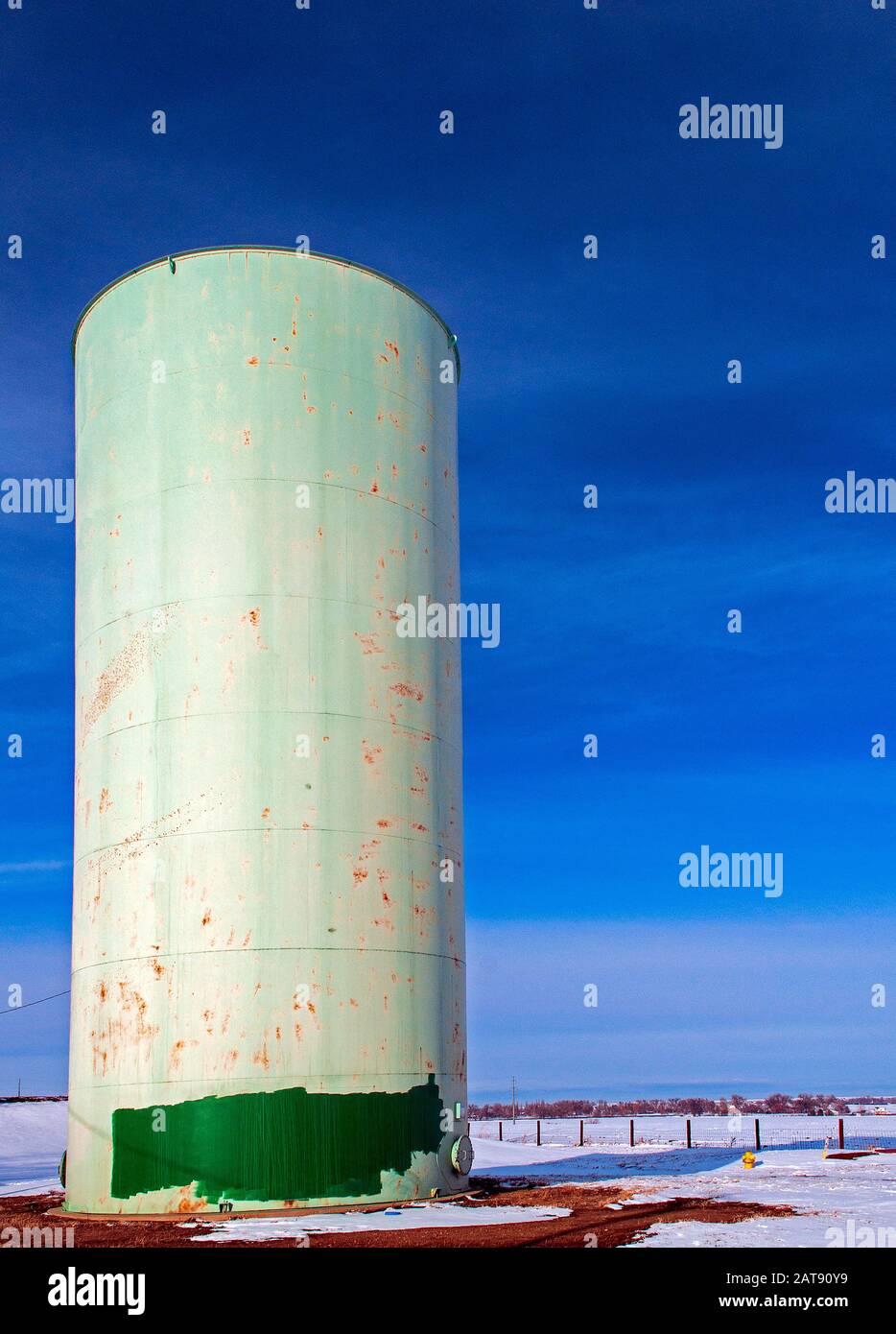 a green water tower in colorado Stock Photo - Alamy