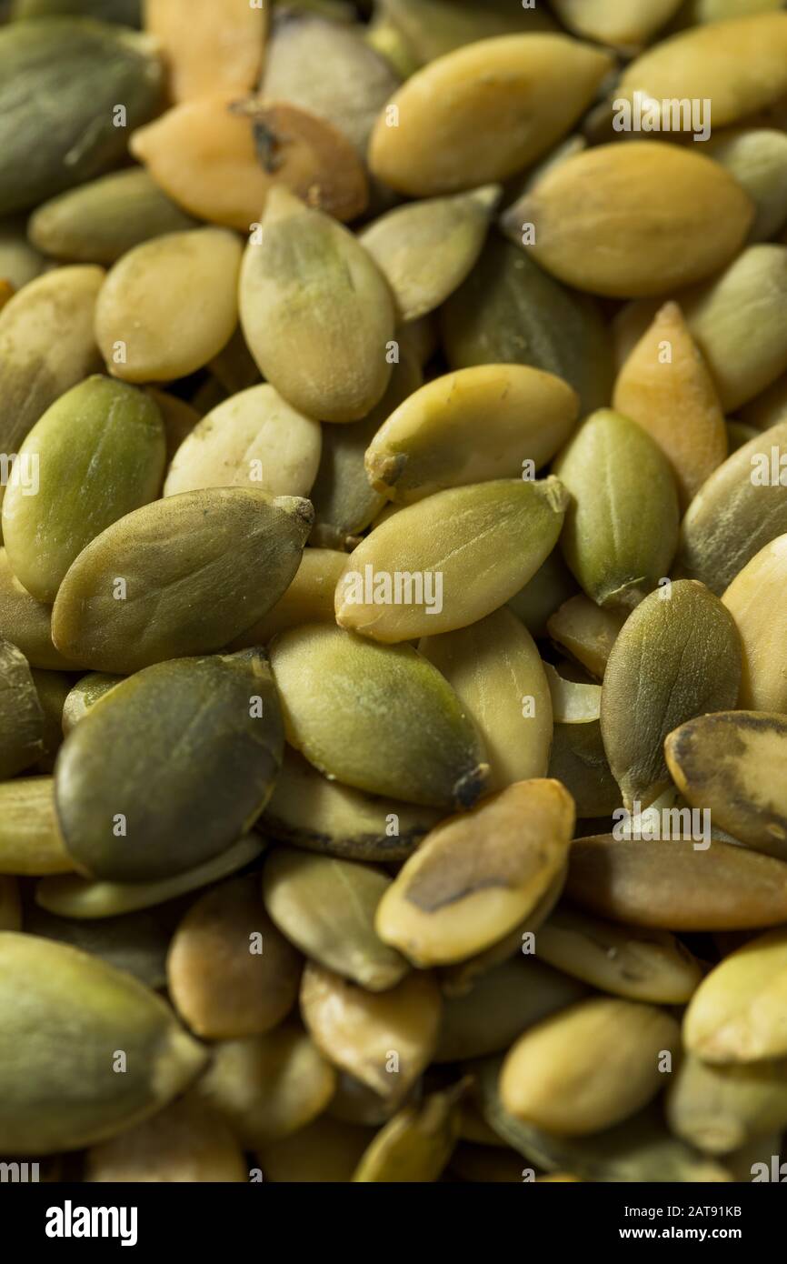 Raw Green Organic Pumpkin Seed Pepitas in a Bowl Stock Photo - Alamy