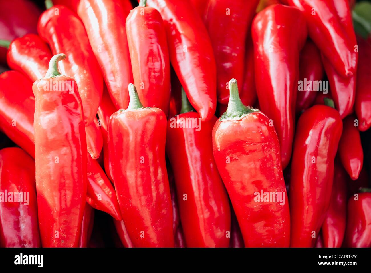 Heap Of Ripe Big Red Peppers as background. Background and red pepper ...