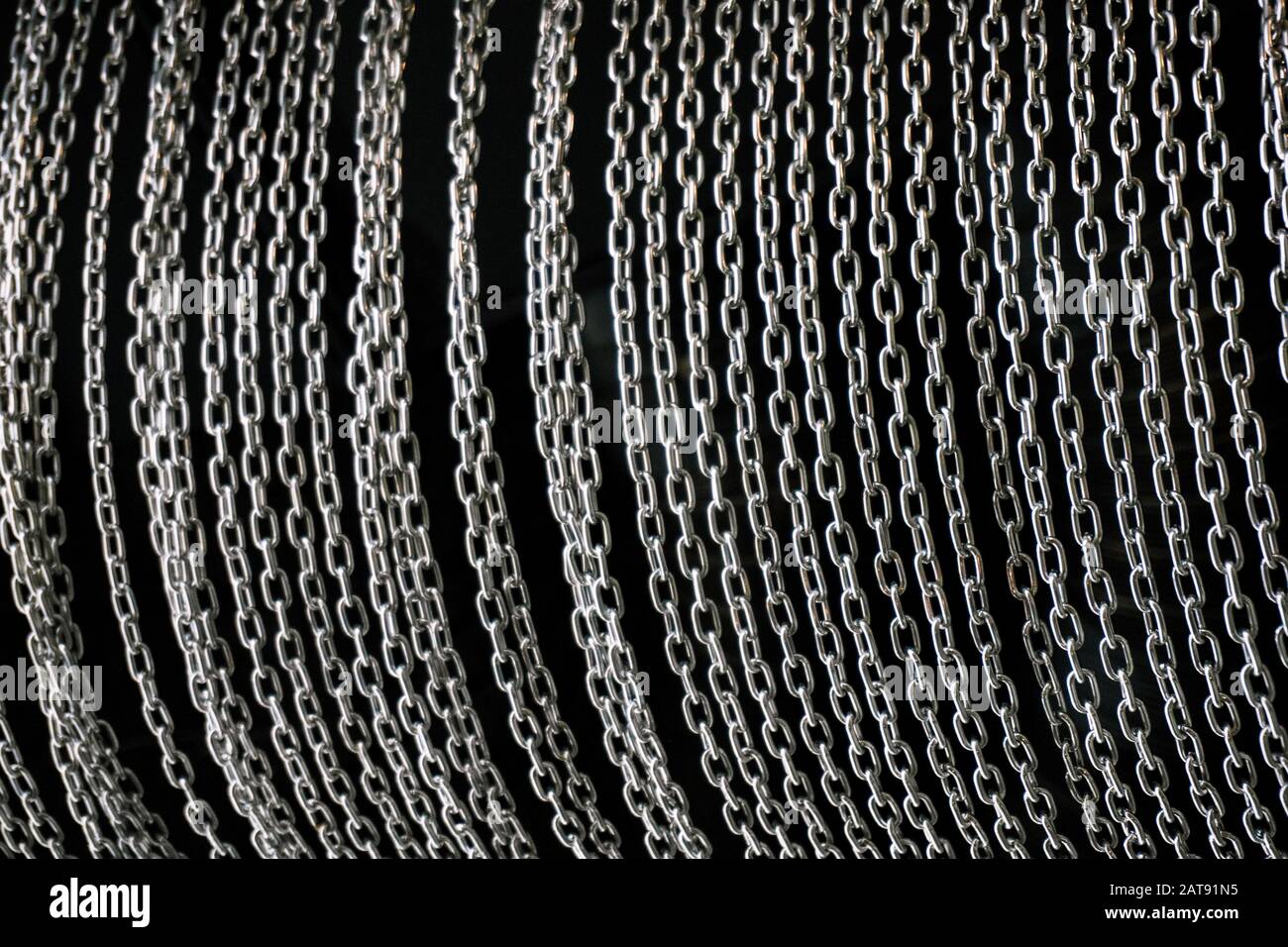 Lots of metal chains on a black background. Background of chains Stock ...