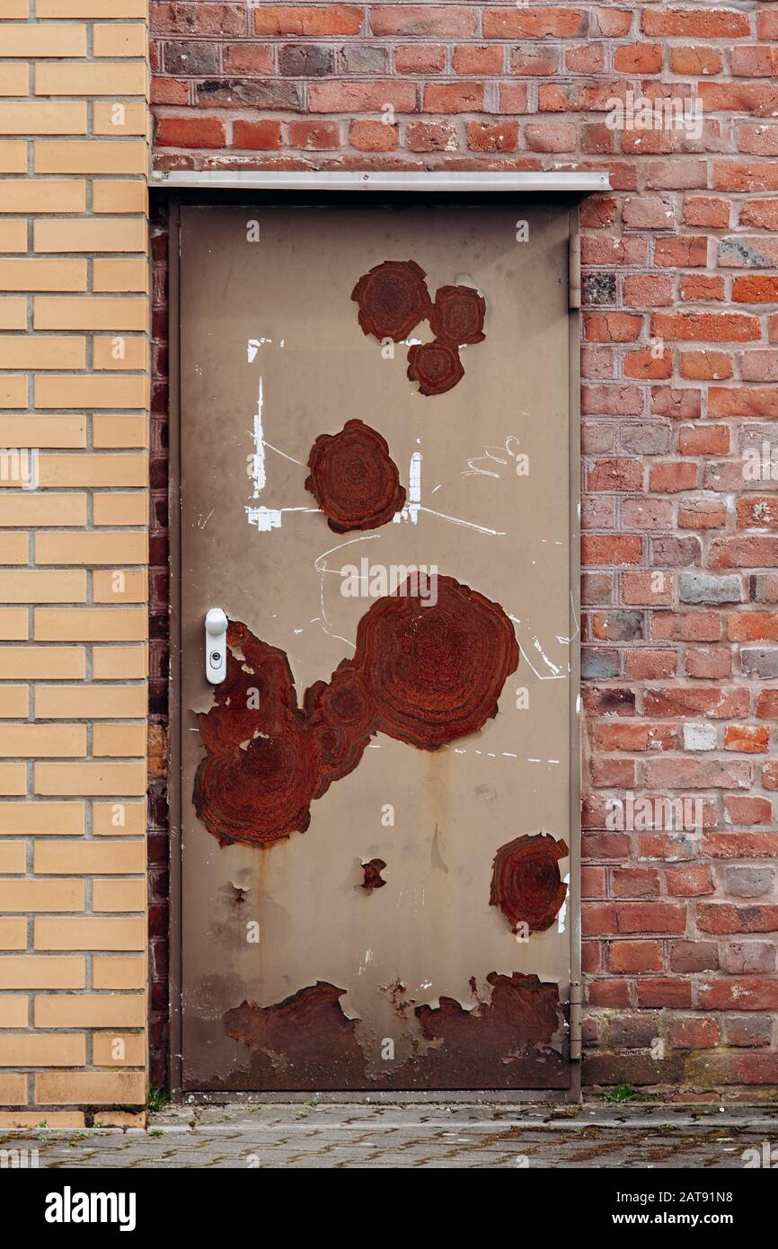 Old metal door with rust and cracking paint Stock Photo - Alamy